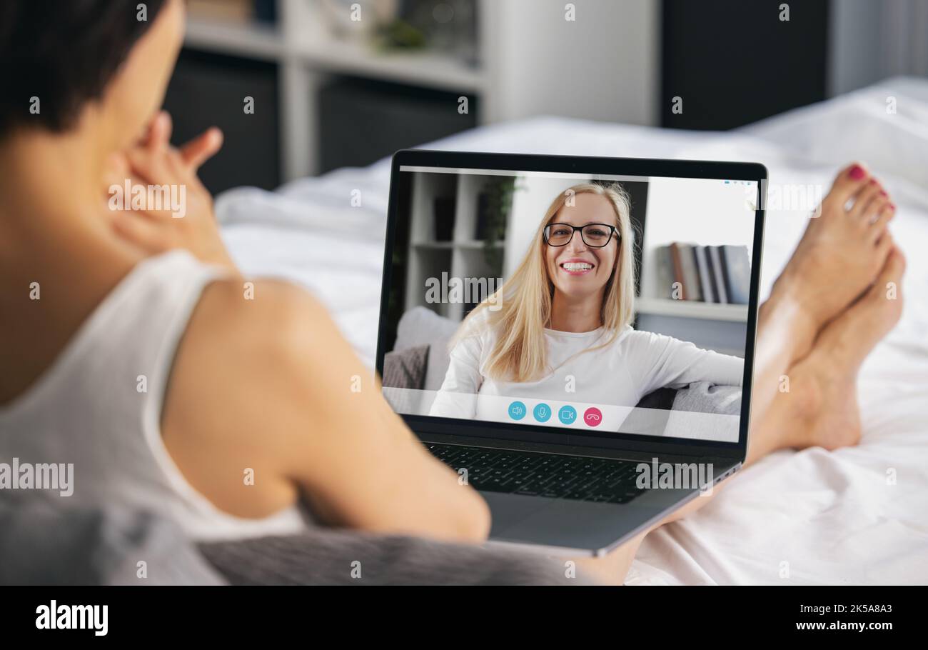 Happy women have video call Stock Photo - Alamy
