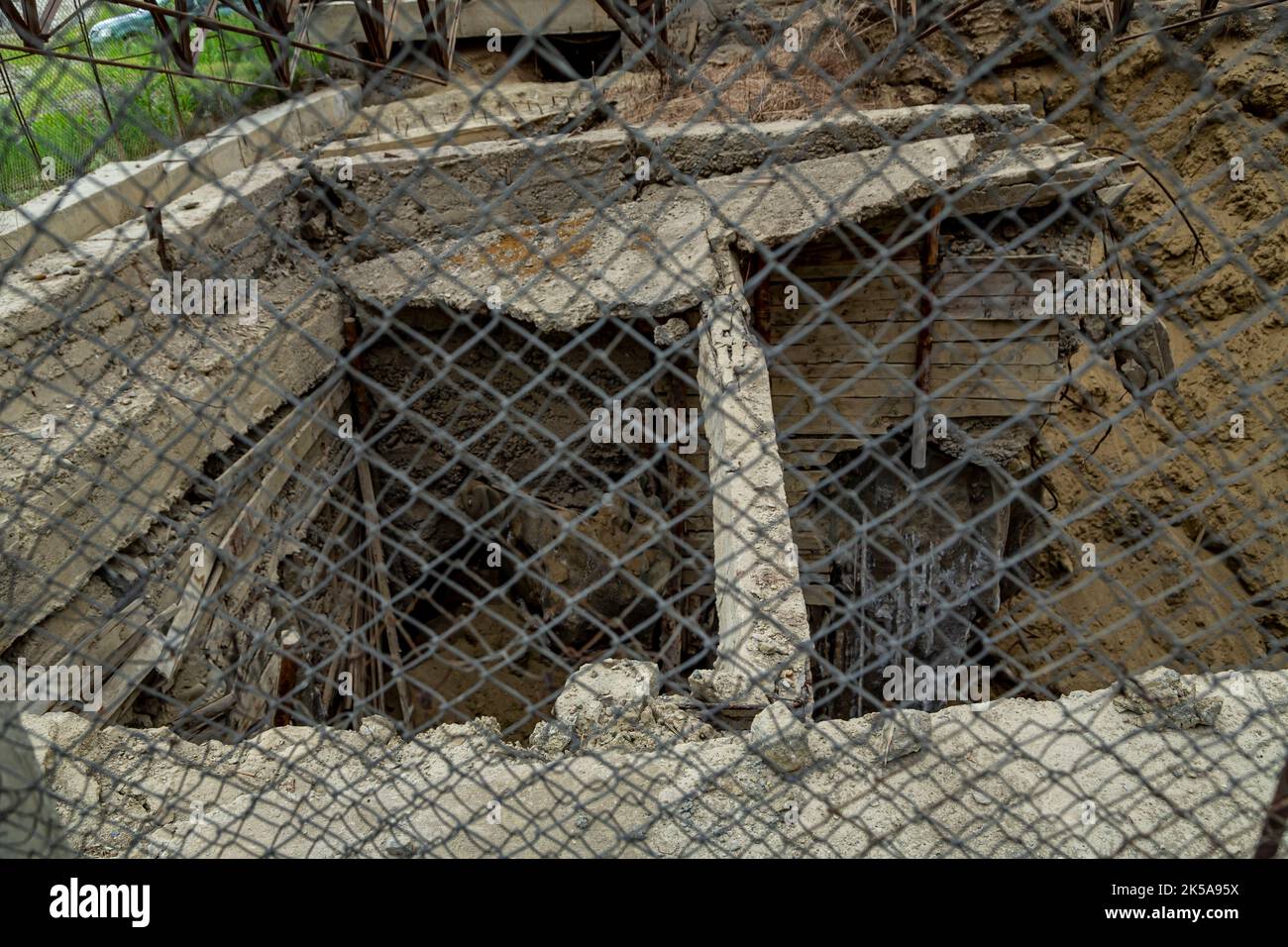 The old access well to the Praid salt mine, now closed, is in danger of ...
