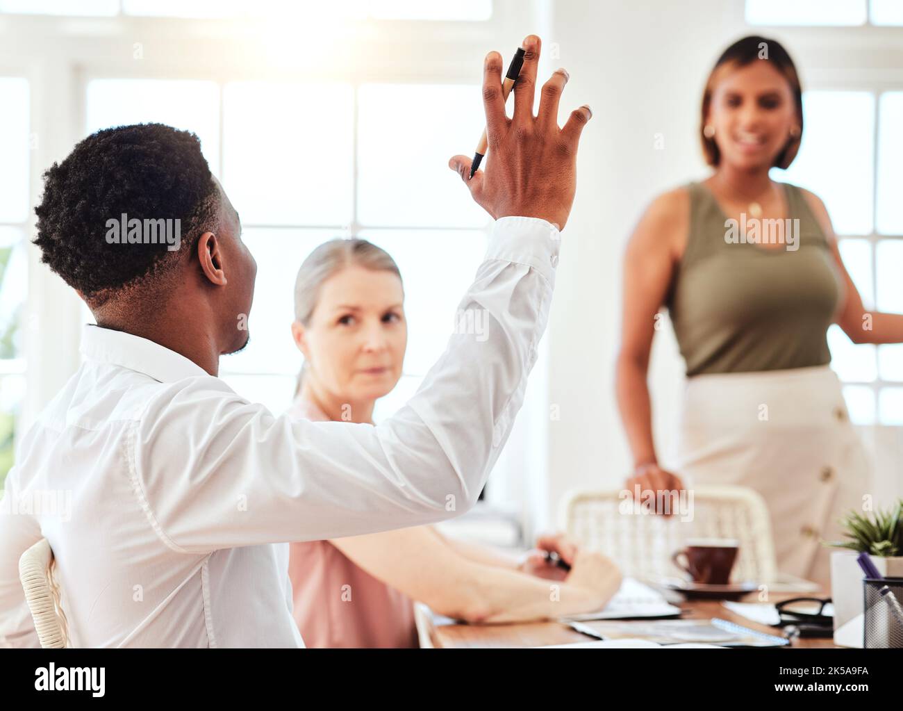 Raised hand hi-res stock photography and images - Alamy