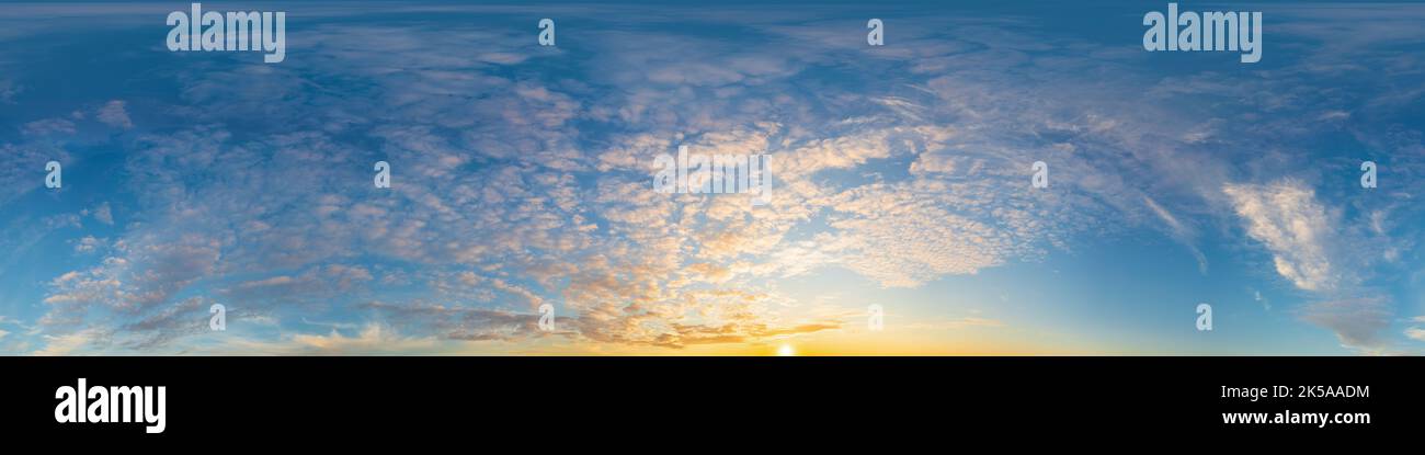 Dark blue sunset sky panorama with golden Cirrus clouds. Seamless hdr ...