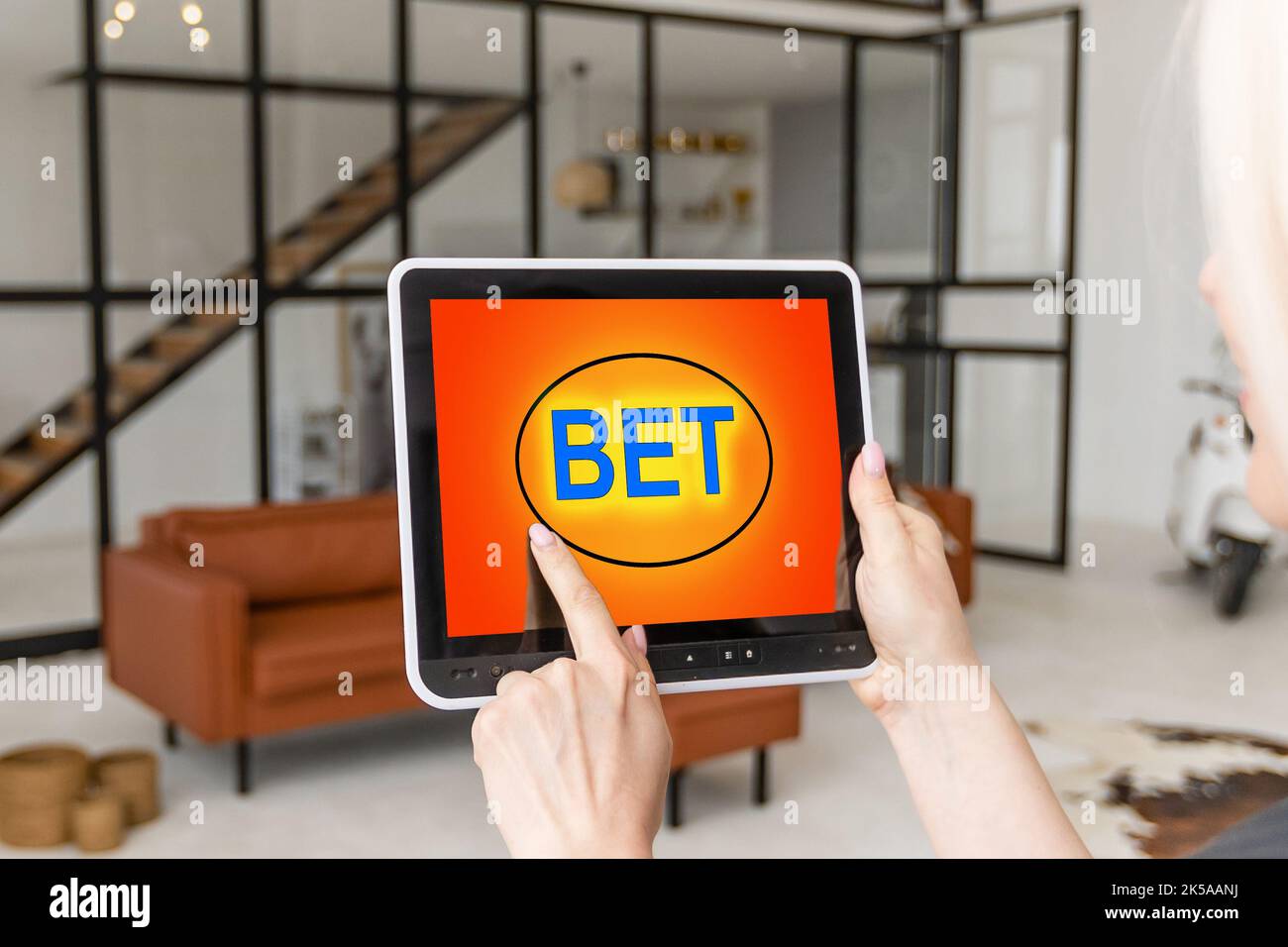 Online casino. A young woman makes bets in an online game. a woman ...