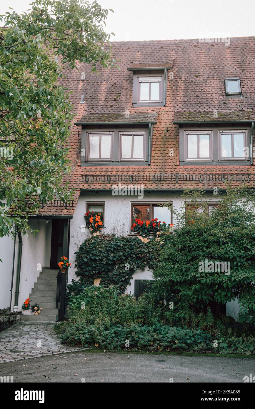 Traditional small house with beautiful outdoor decor facade in Germany ...