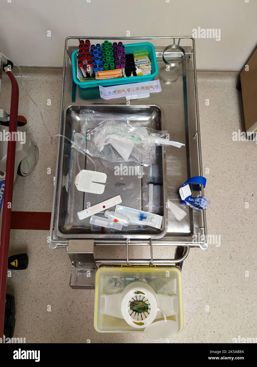 Stainless steel trolley in emergency room at hospital contains blood ...