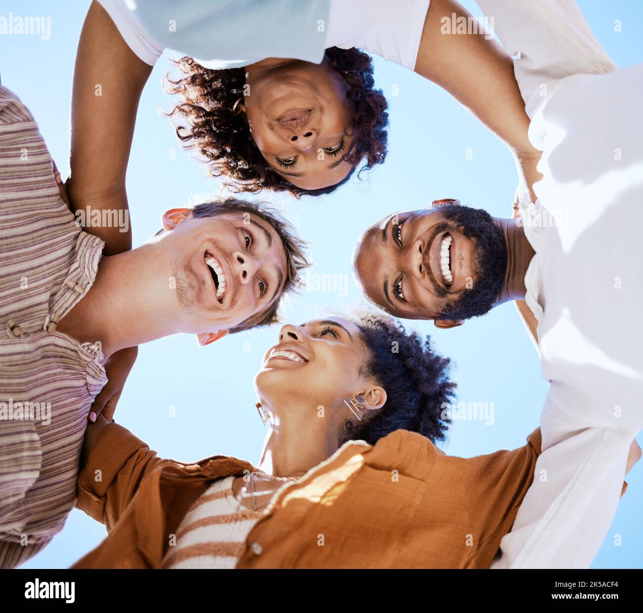 Friends, teamwork and happy with a man and woman group standing in ...