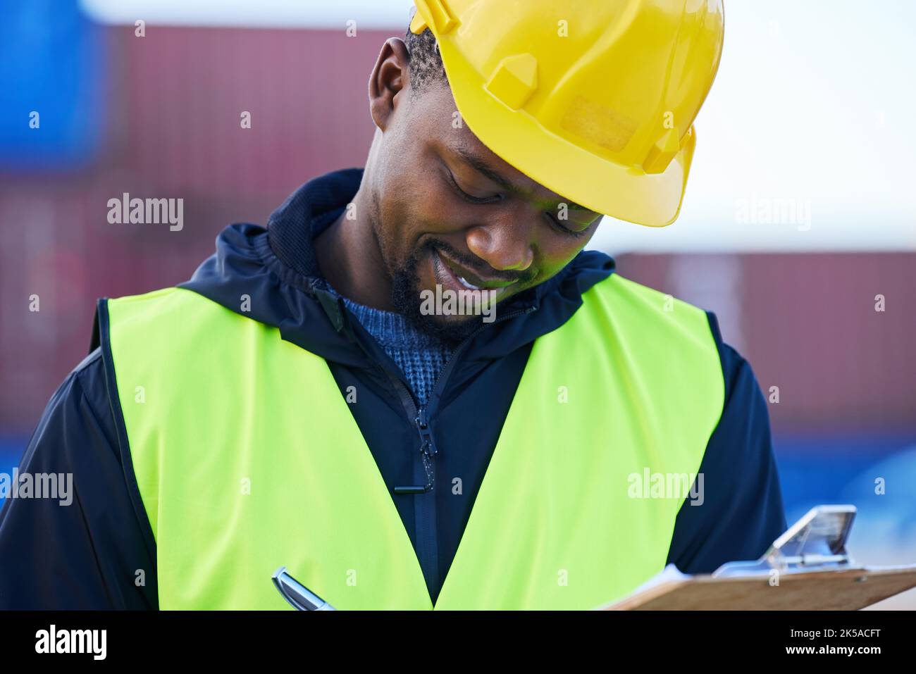 Logistics, shipping and checklist by black man engineer writing ...