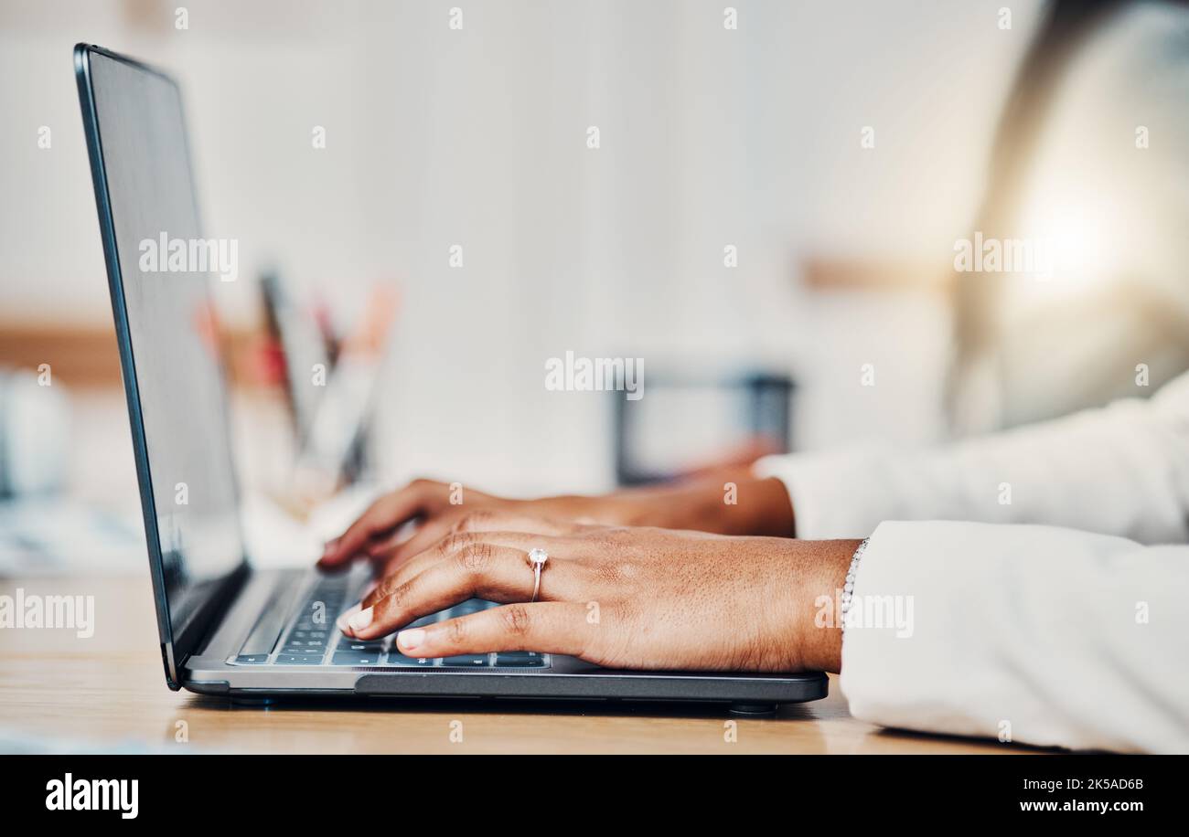 Hands, black woman and typing on laptop at office, planning financial business strategy email ...