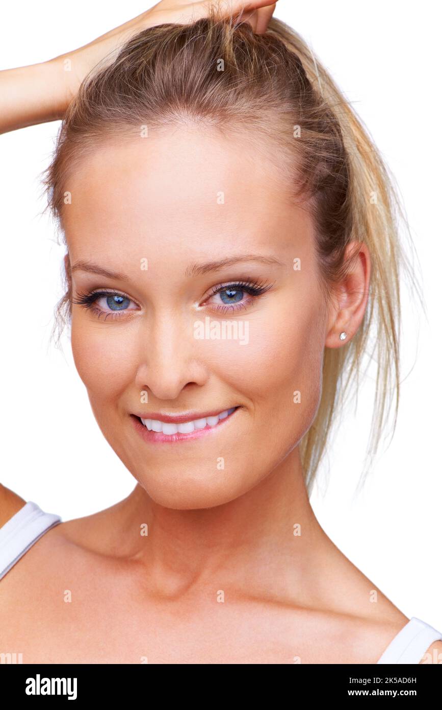 Biting her lip enticingly. Portrait of a beautiful young woman biting ...