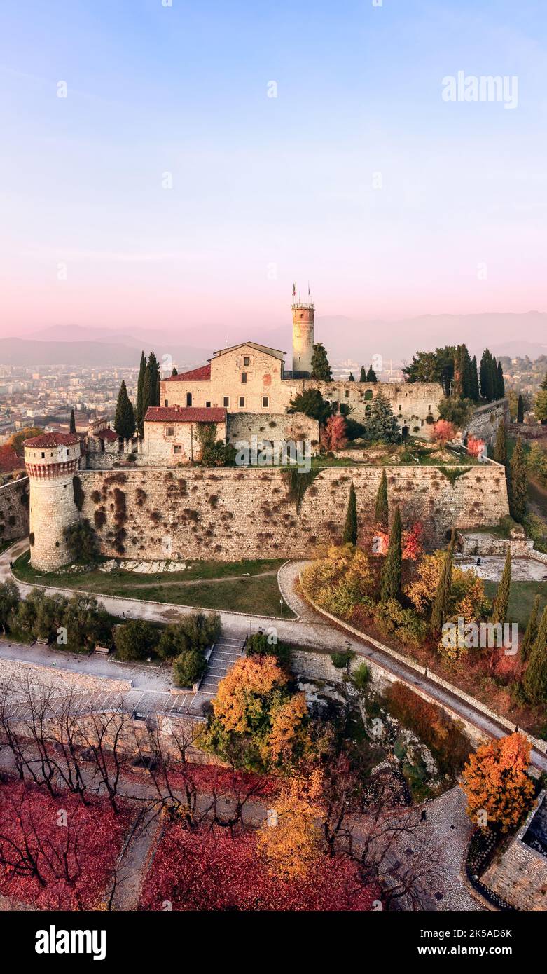 Vertical panoramic drone view on eastern part of castle in Brescia and ...