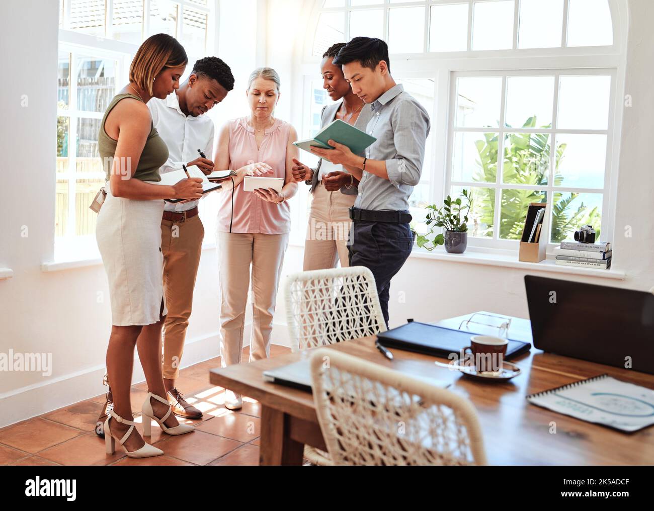 Business coach, startup team workshop and mature business woman ...