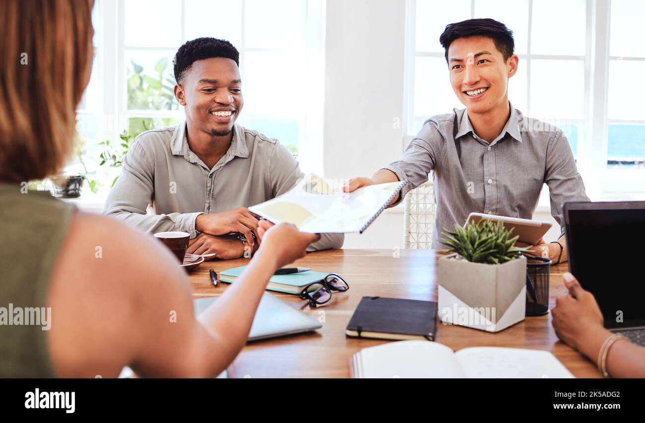 Report, meeting and business team talking about a document at a ...