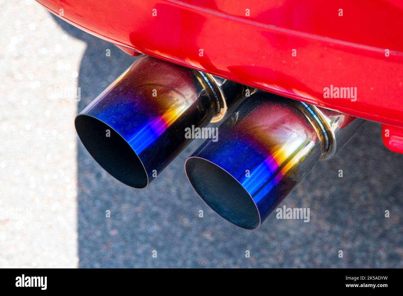 double exhaust pipe of a red car. High quality photo Stock Photo - Alamy