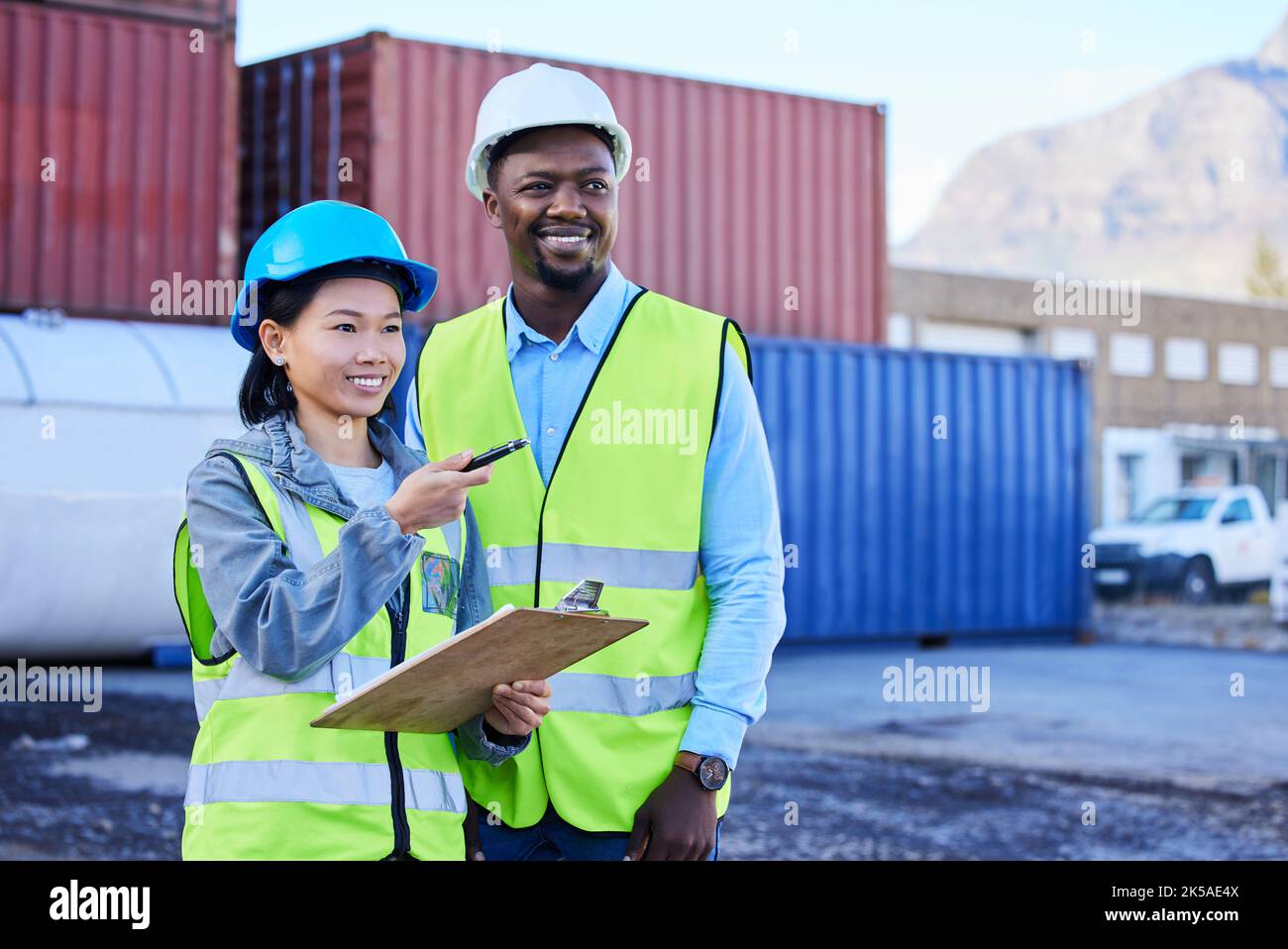 Logistics, planning and employees talking about cargo delivery while ...