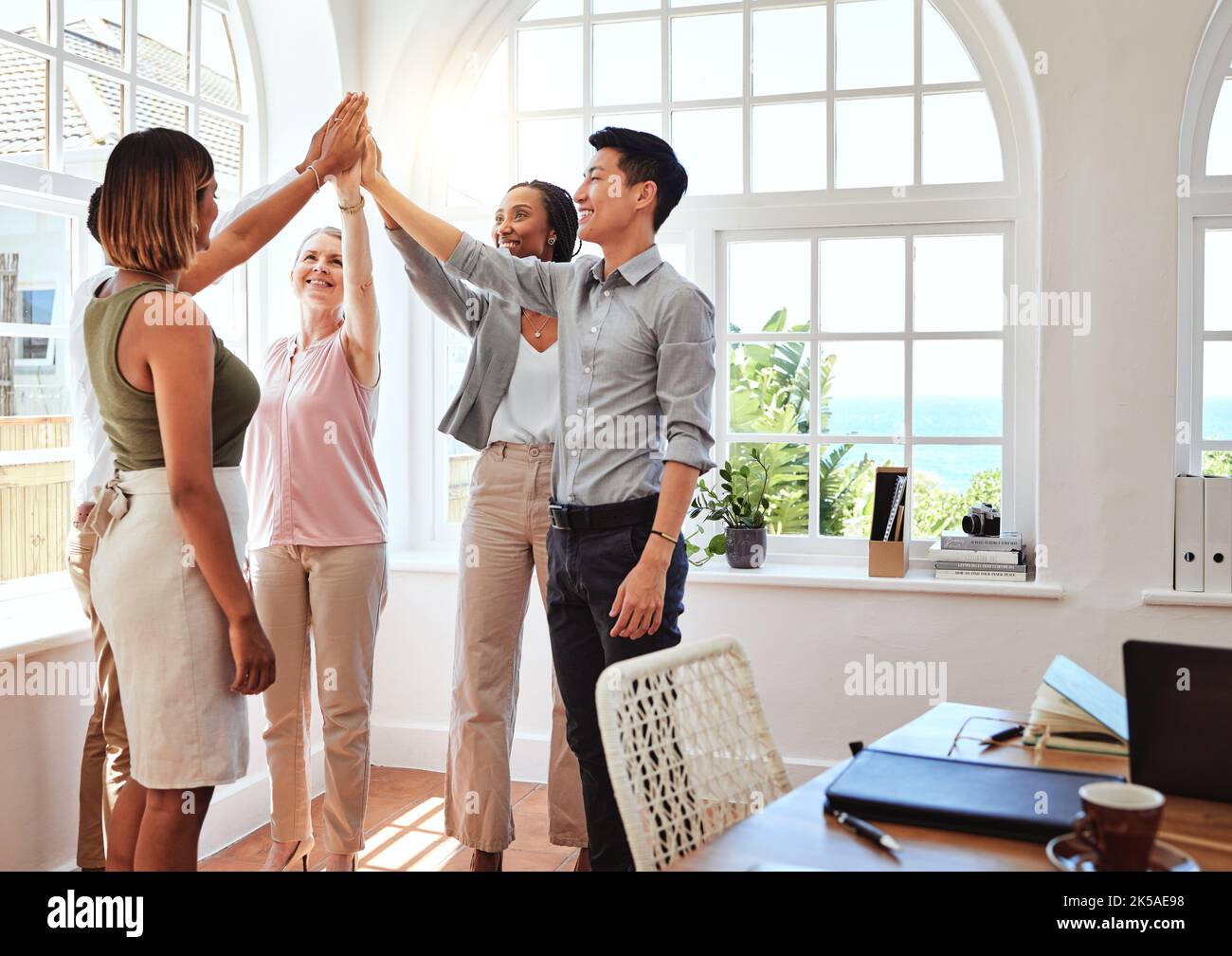 Corporate, teamwork and high five for success in office for professional business project idea ...