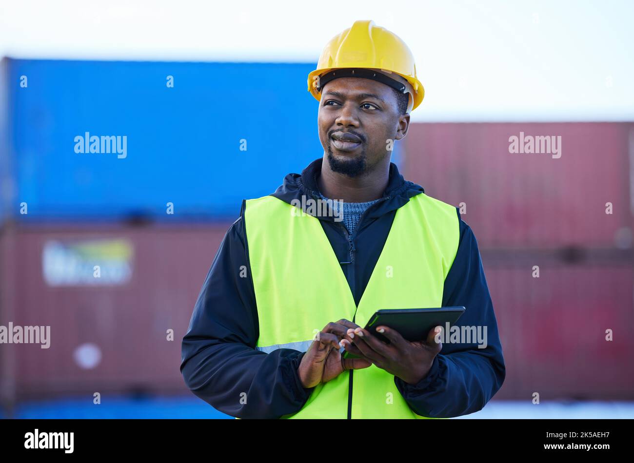 Tablet, black man and cargo planning logistics for shipping company ...