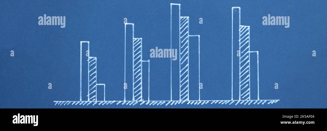 Chart growth indicators are drawn on blue background closeup Stock ...