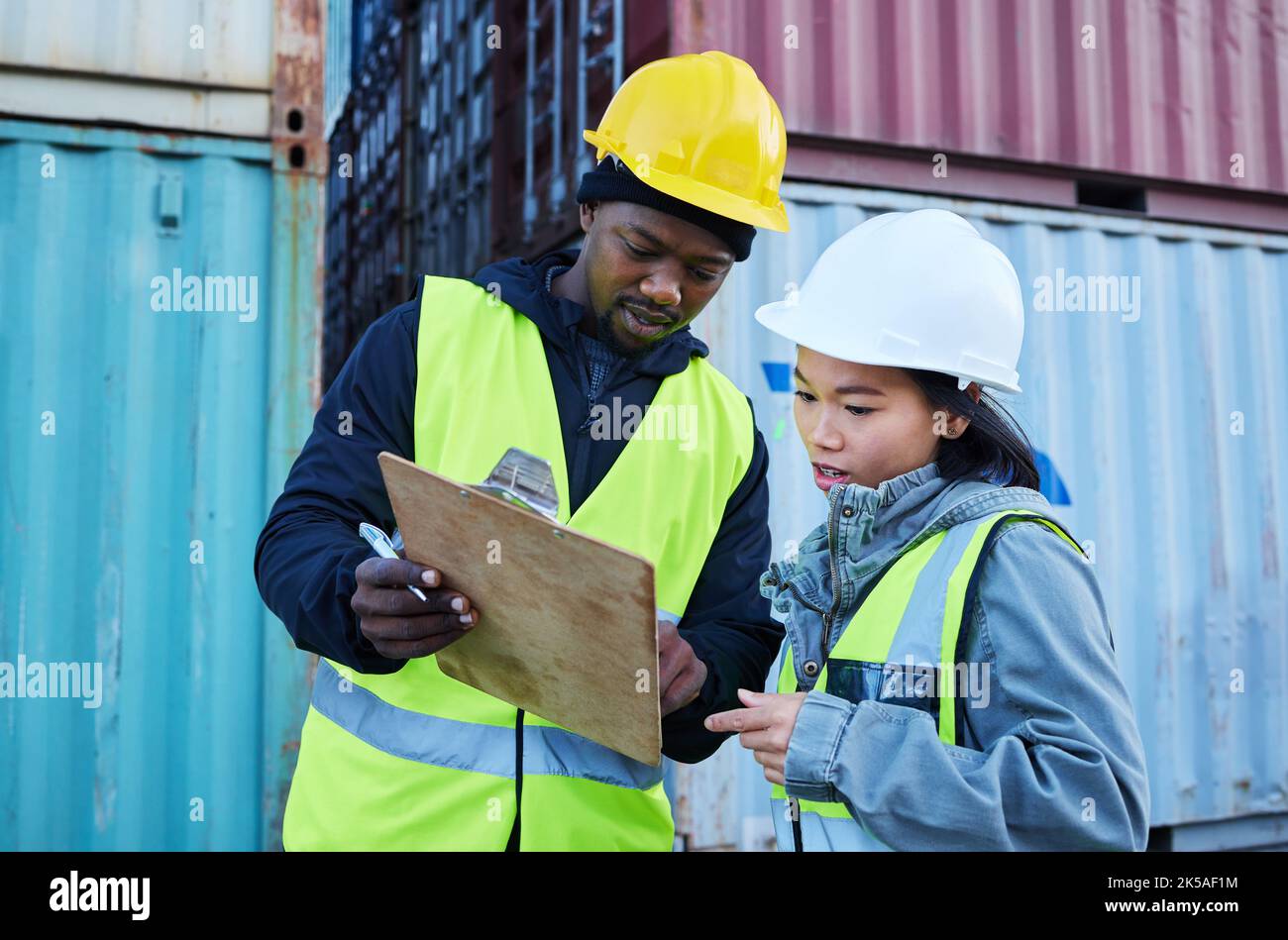 Logistics, clipboard and diversity team work on cargo, container and ...