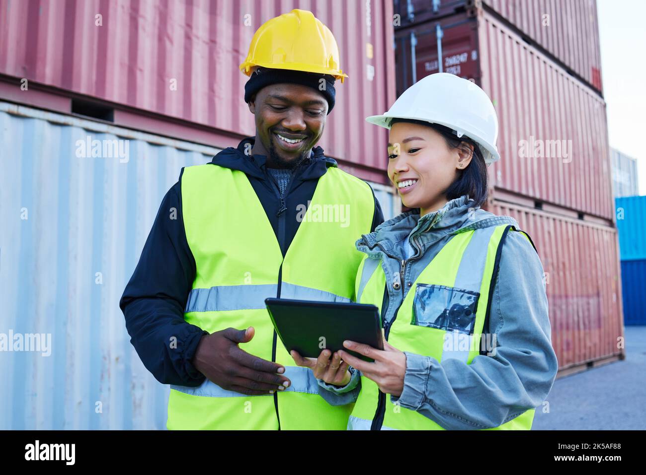 Logistics, cargo and diversity team with tablet check world, global or ...