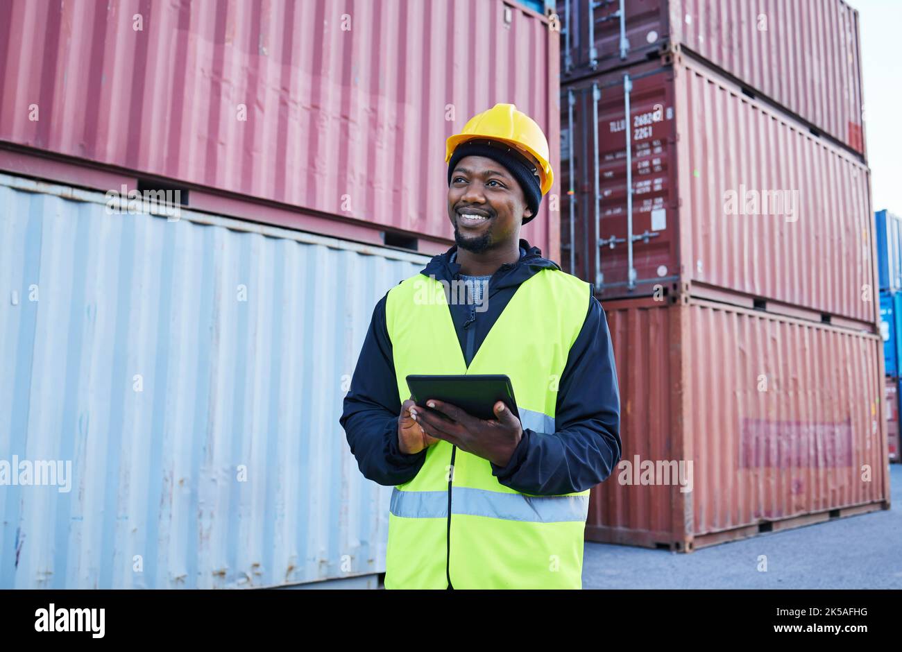 Tablet, logistics and shipping with a supply chain black man manager ...