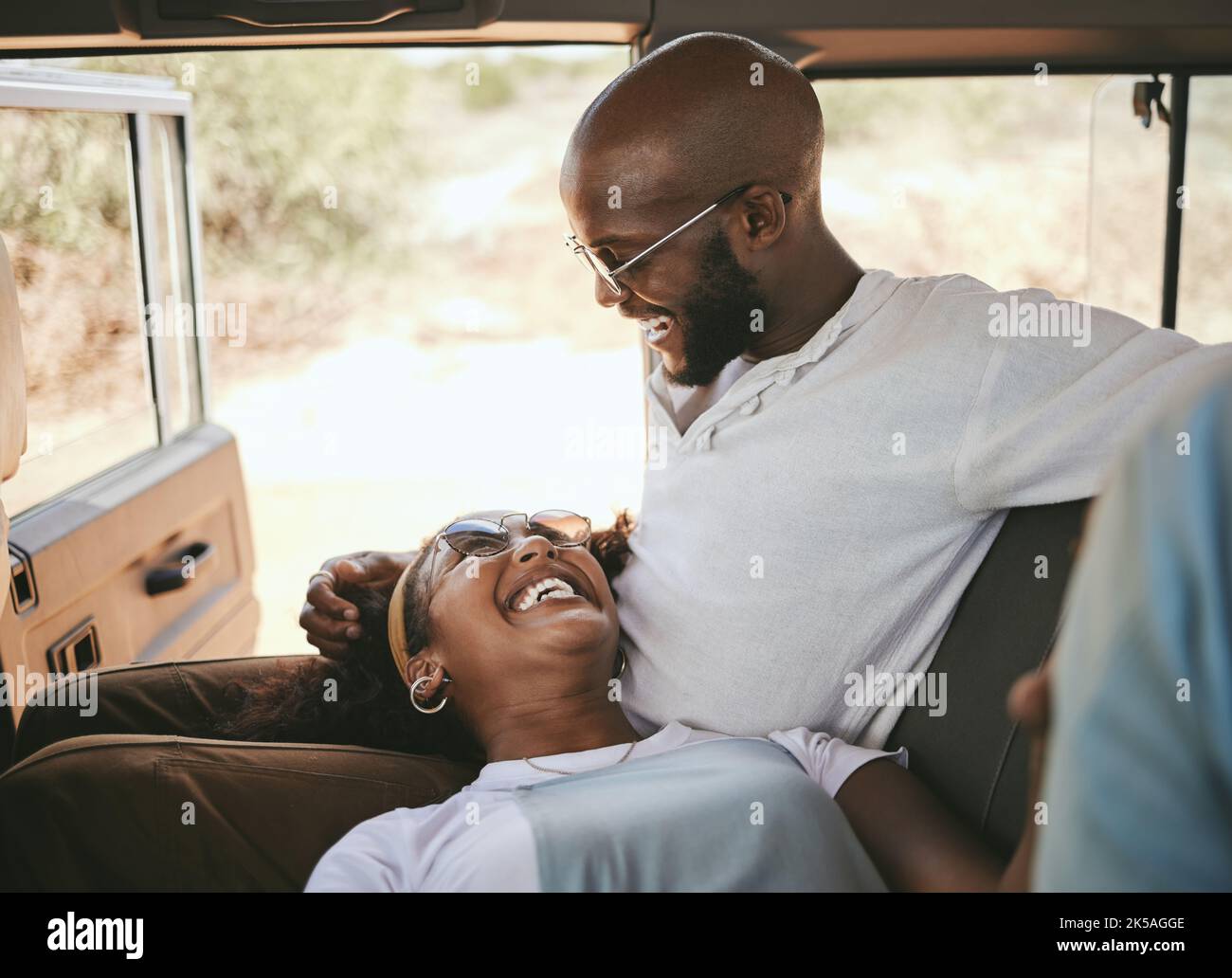 Road trip, black couple and travel during drive through nature on a ...