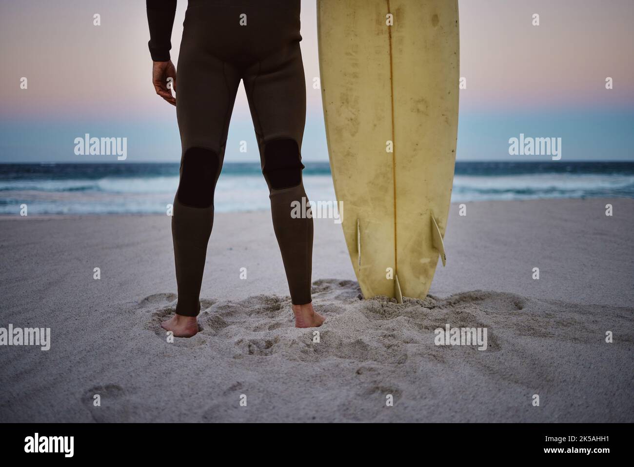 Feet of man on beach sand, surfer in nature look at waves in Hawaii and ...