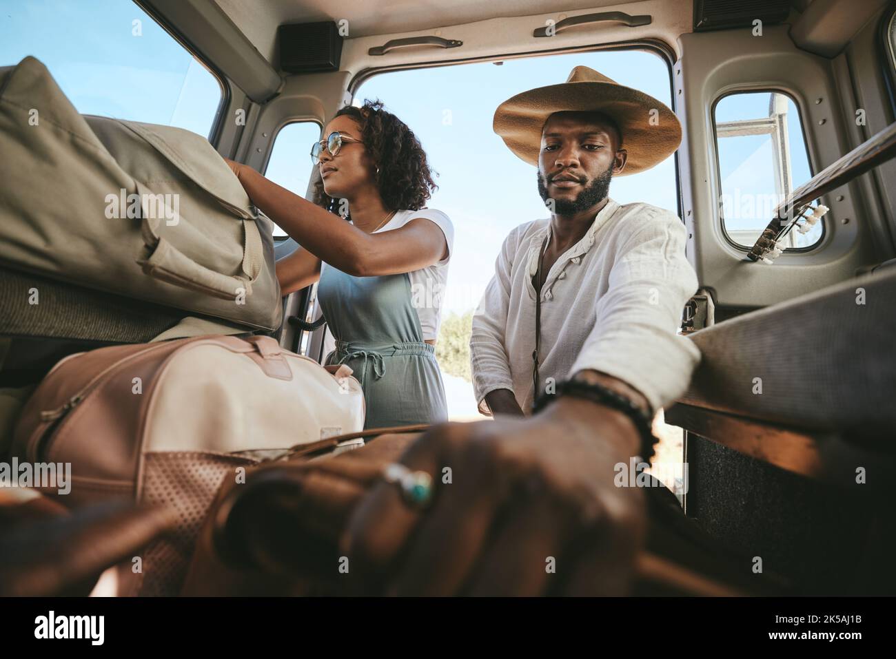 Travel luggage, black couple and car road trip together love bonding on ...