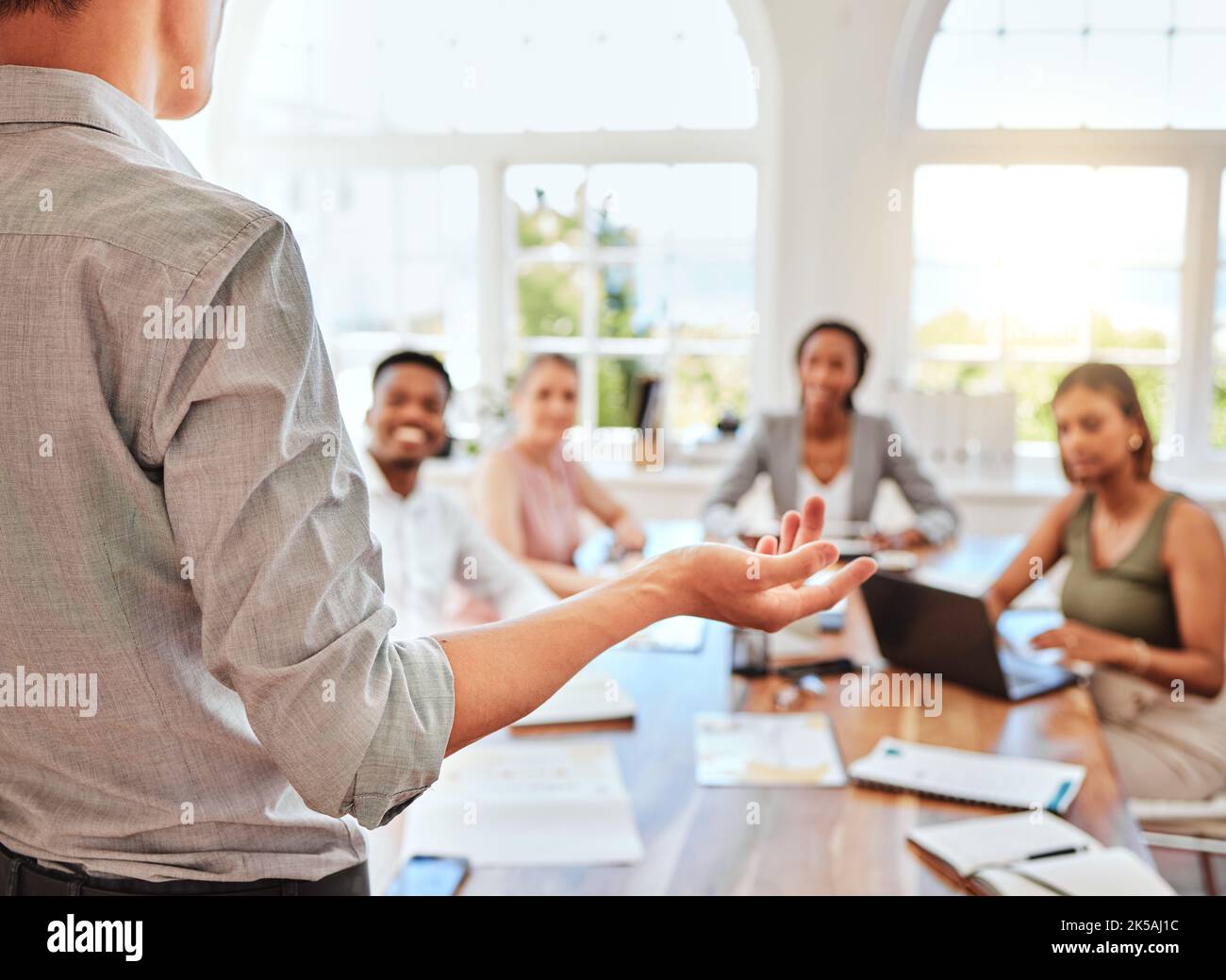 Presentation, training and workshop with hand gesture of manager ...