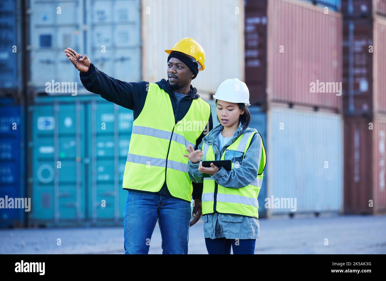 Logistics, tablet and employees working in shipping and doing ...