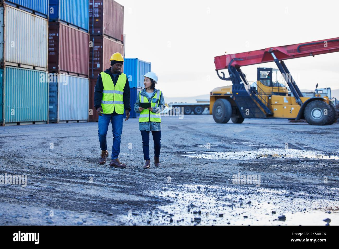 Tablet, container and engineer teamwork planning for manufacturing ...