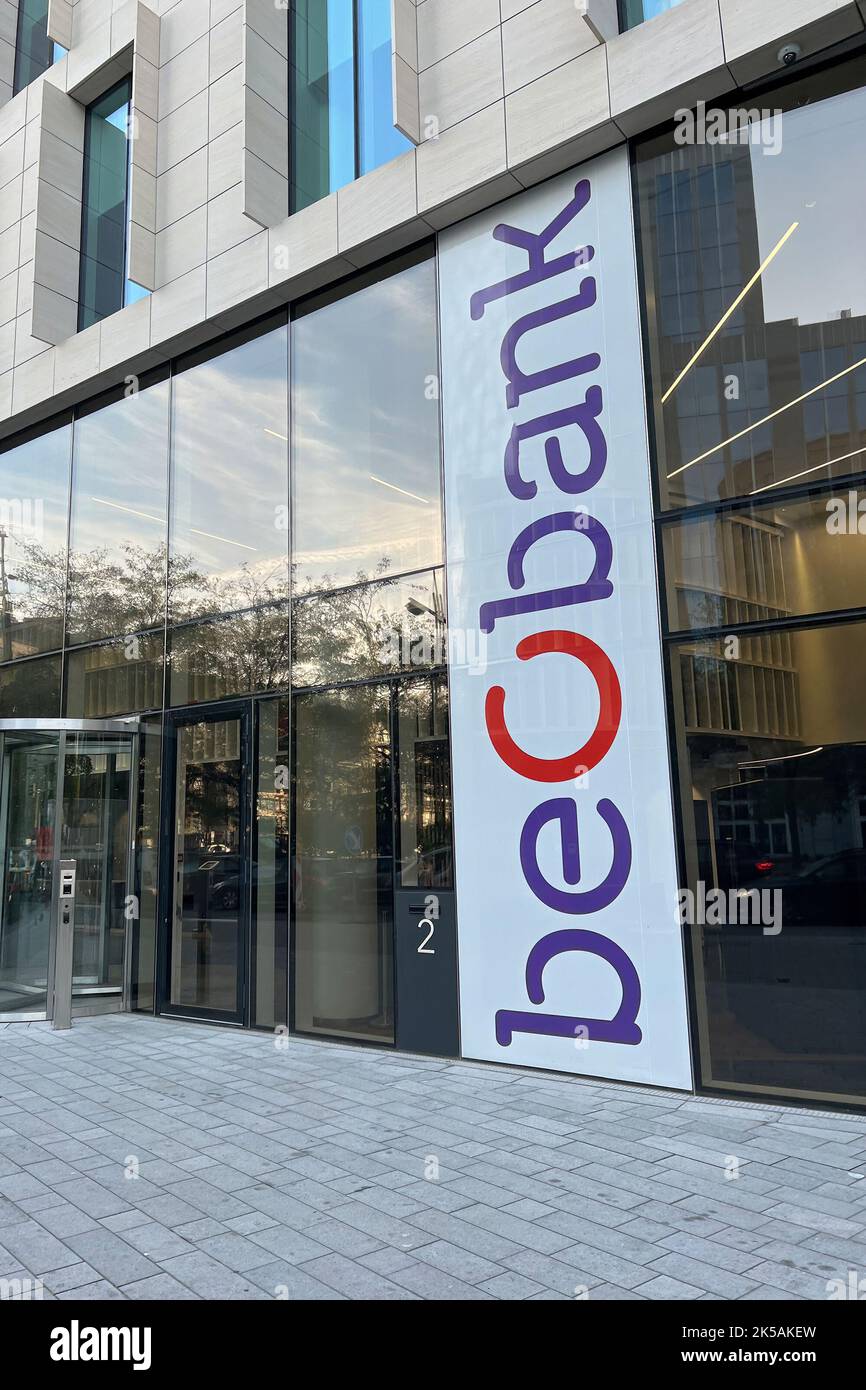 Vertical closeup on a blue and red lettered Belgian Beobank banner ...