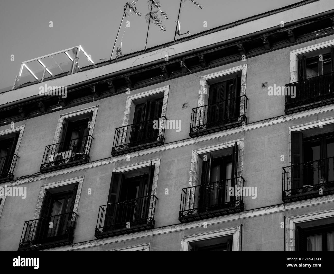 View of the exterior of an old residential building with balconies ...
