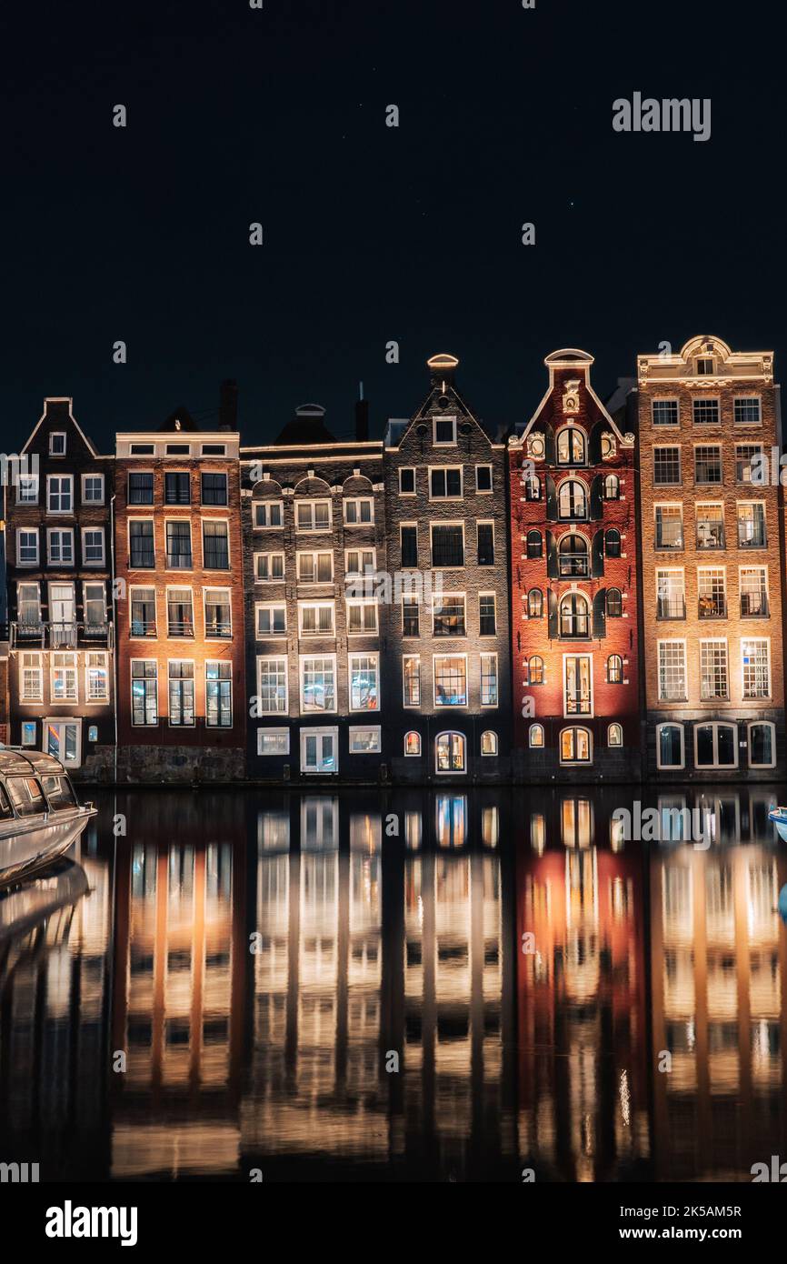 Dancing Houses Damrak Amsterdam during the night Netherlands Holland ...
