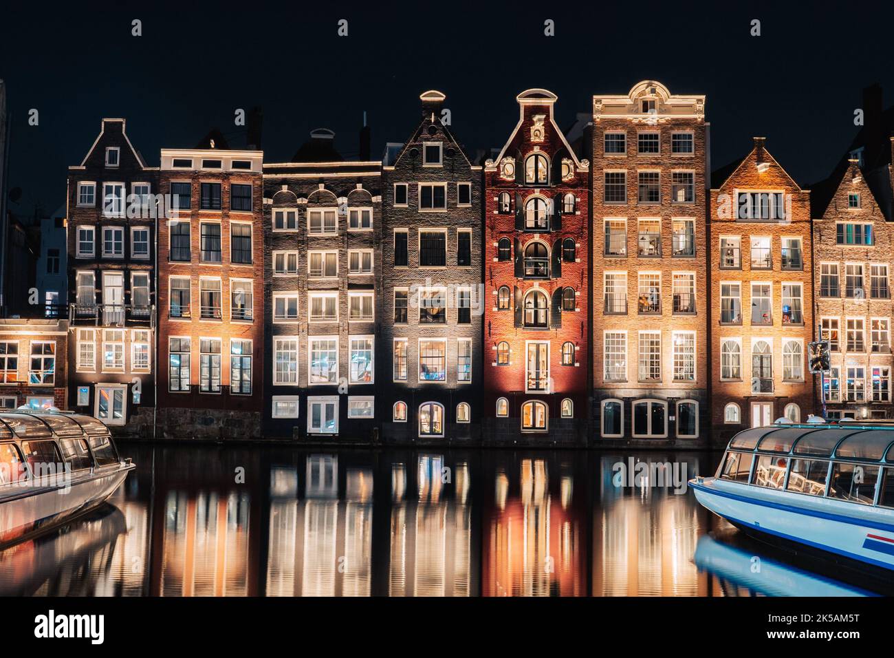 Dancing Houses Damrak Amsterdam during the night Netherlands Holland ...