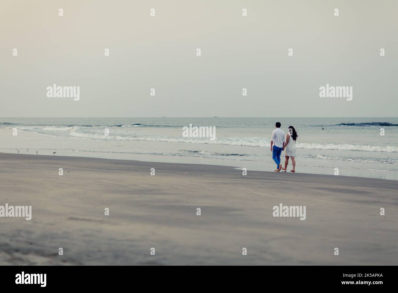 Happy Romantic Middle Aged Couple Enjoying Beautiful Sunset Walk on the ...