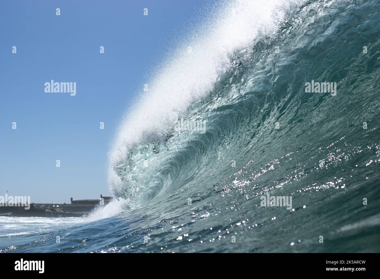 A gorgeous view of a bright blue sea with vicious tides rising and ...