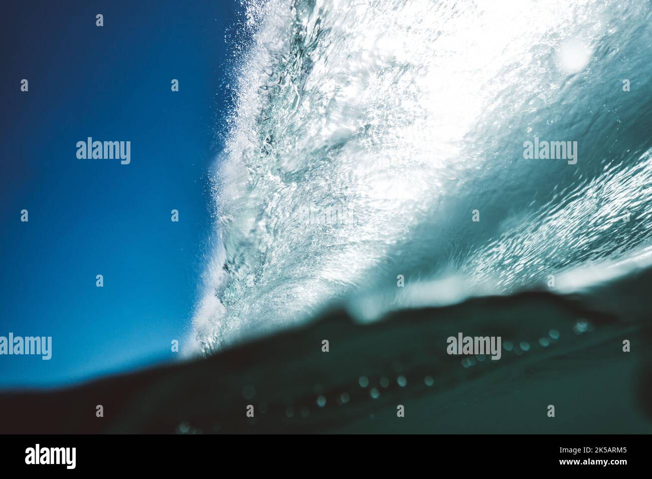 A gorgeous view of a bright blue sea with vicious tides rising and ...