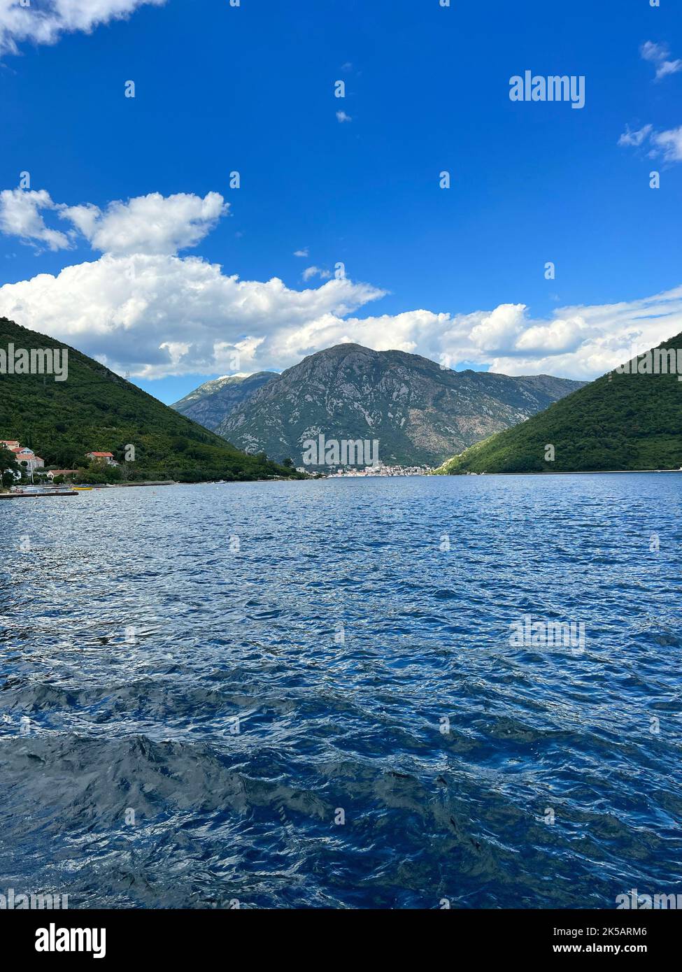 A vertical shot of the Bay of Kotor in Herceg Novi, Montenegro with ...