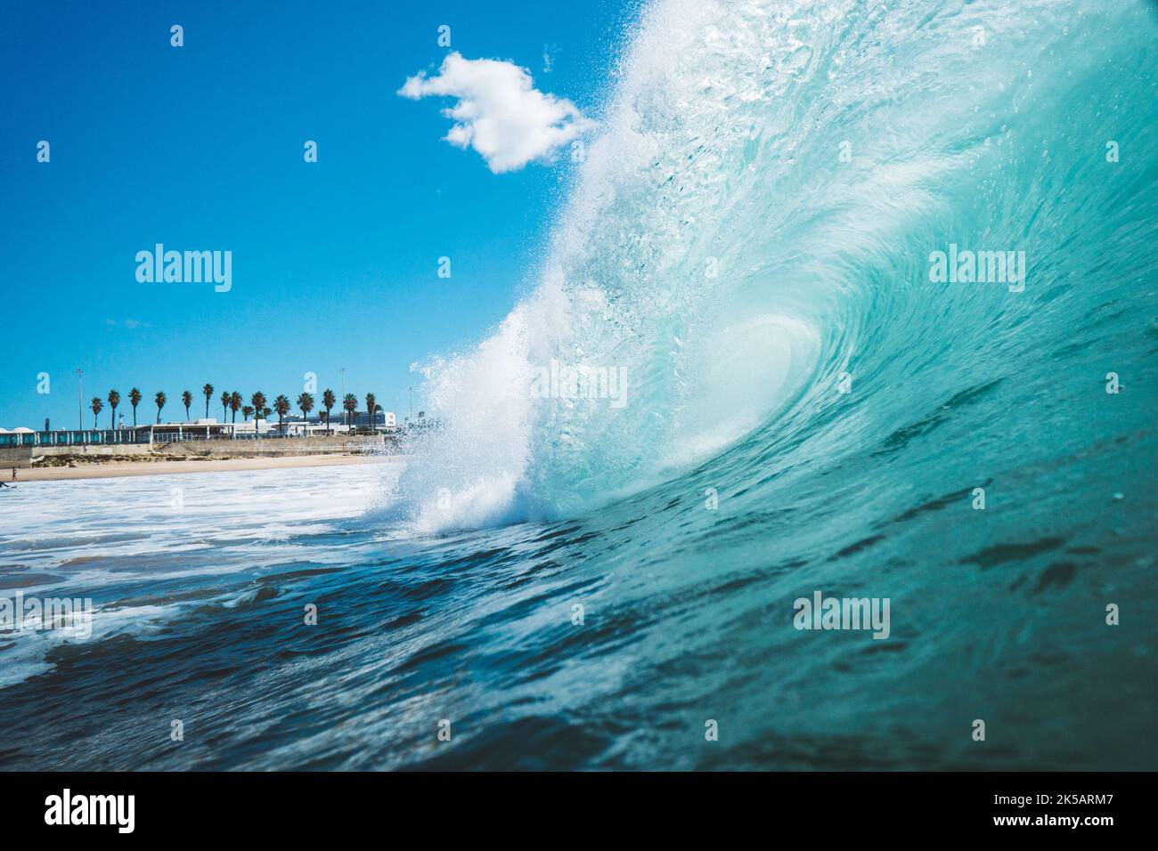 A gorgeous view of a bright blue sea with vicious tides rising and ...