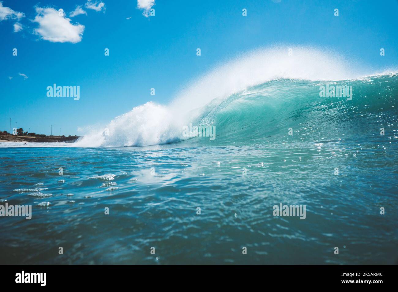 A gorgeous view of a bright blue sea with vicious tides rising and ...