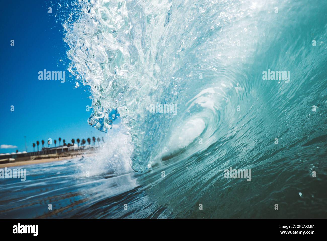 A gorgeous view of a bright blue sea with vicious tides rising and ...