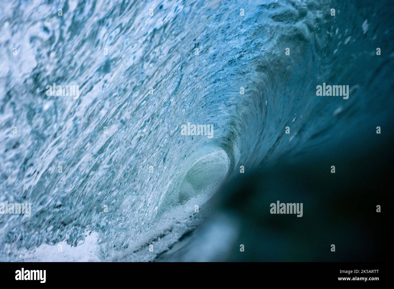 A gorgeous view of a bright blue sea with vicious tides rising and ...