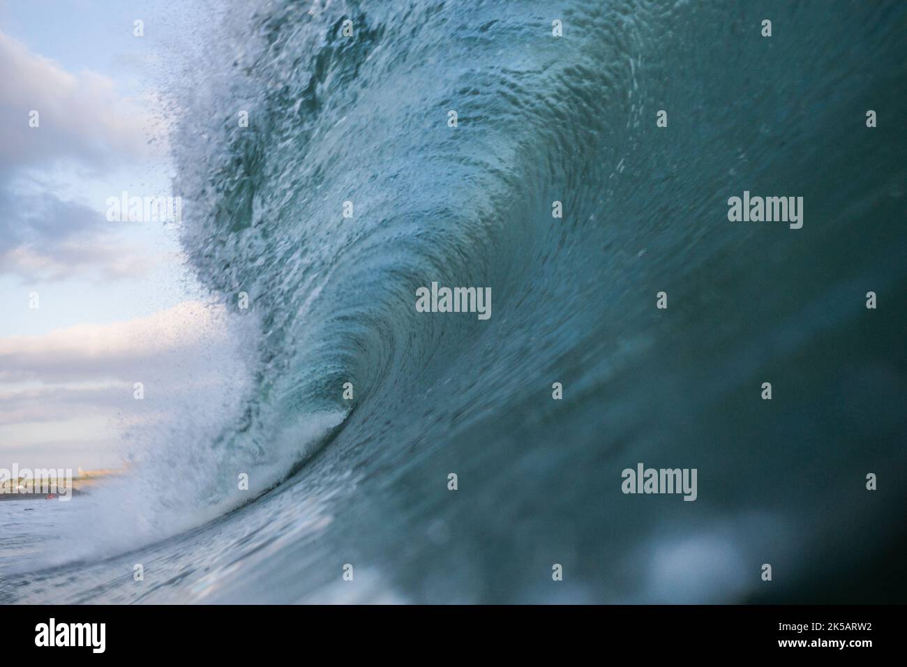 A gorgeous view of a bright blue sea with vicious tides rising and ...