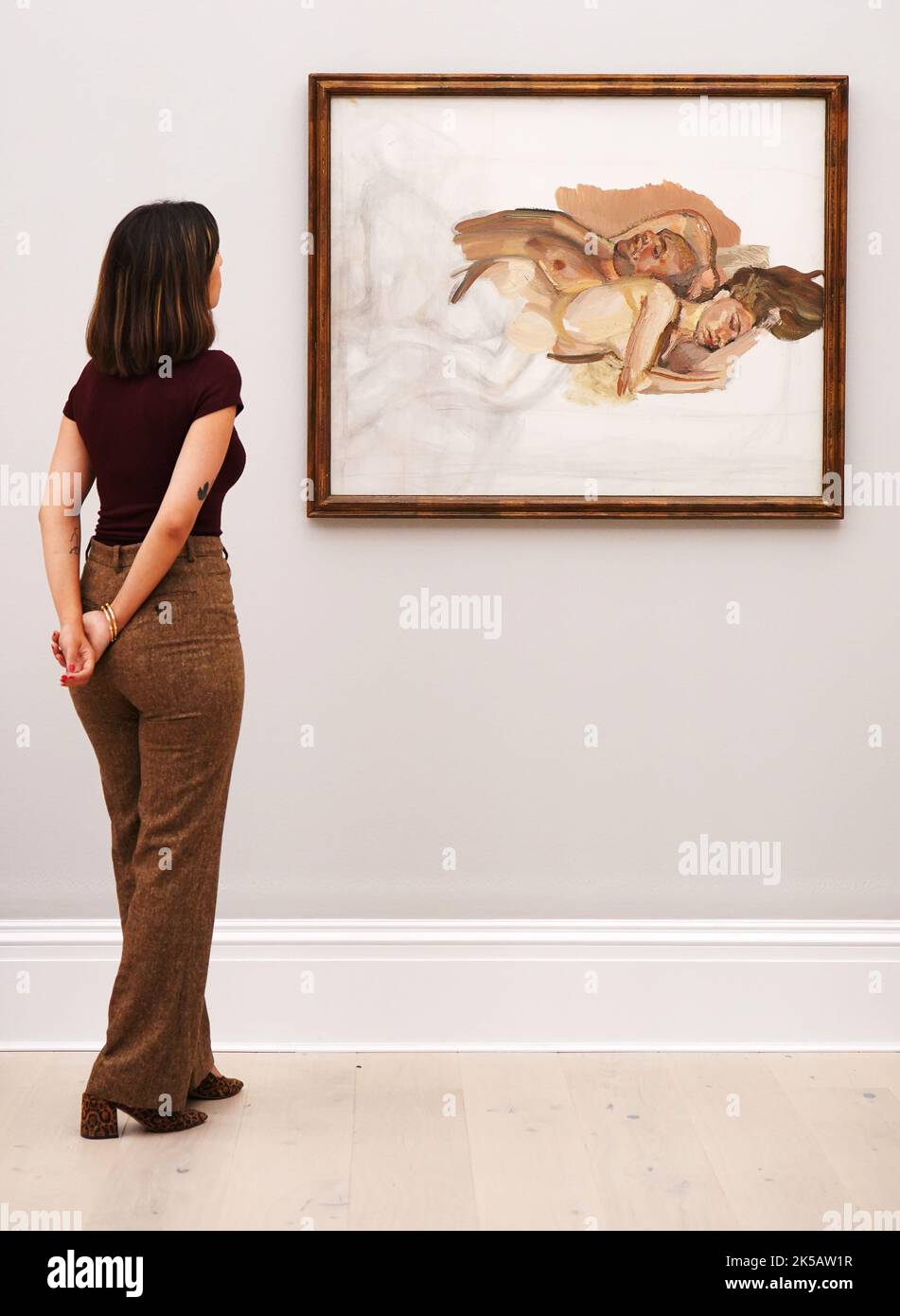 A member of staff looks at 'And the Bridegroom' by Lucian Freud during ...