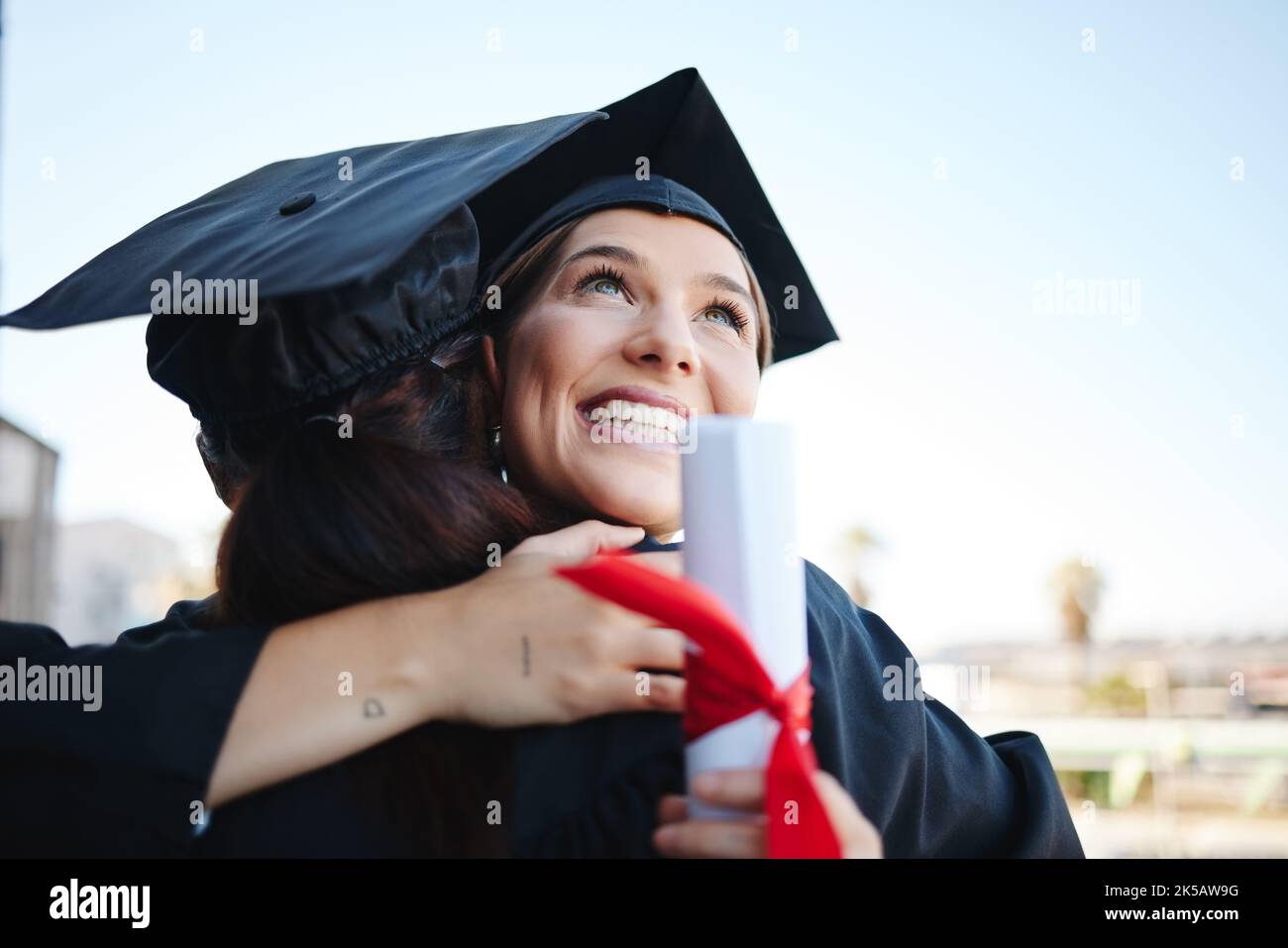 Two students standing together in class hi-res stock photography and ...
