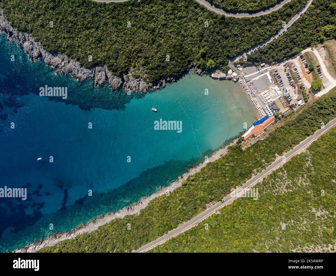 An aerial shot of Trsteno beach with green forest and resort near Stock ...
