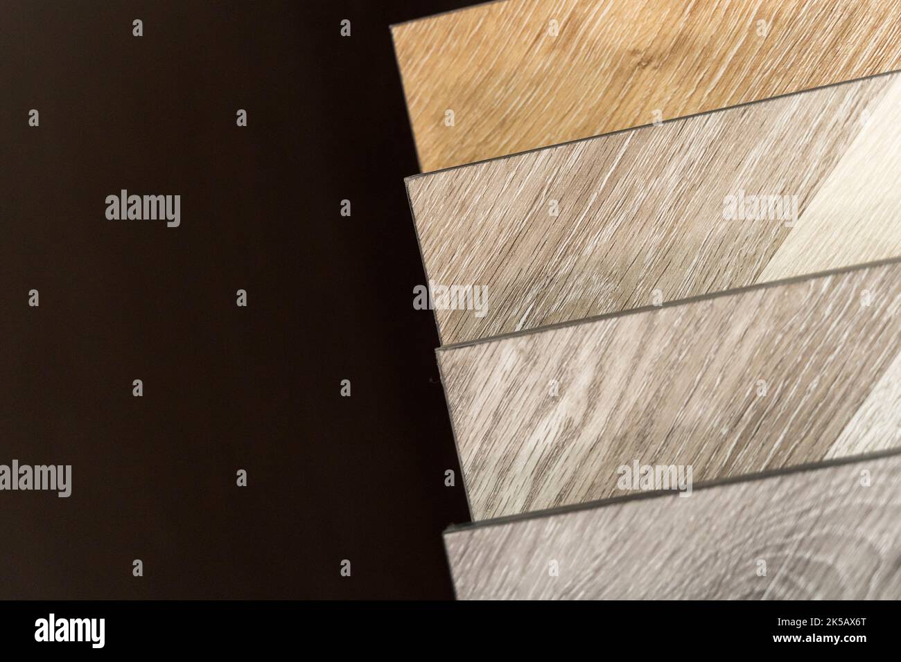 Luxury Vinyl Tile flooring samples at a high end flooring showroom ...