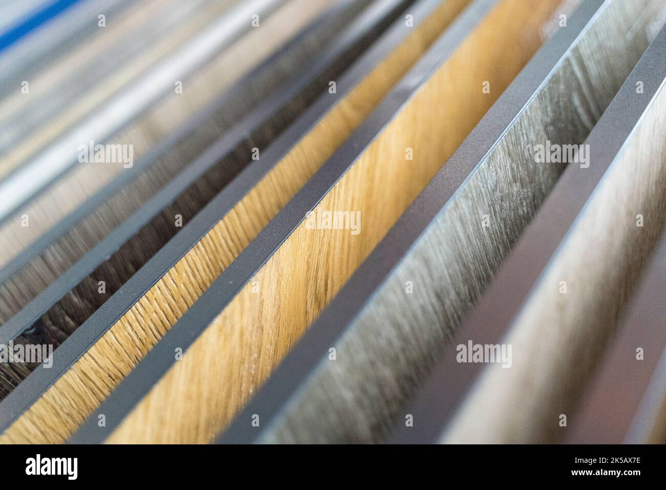 Luxury Vinyl Tile flooring samples at a high end flooring showroom ...