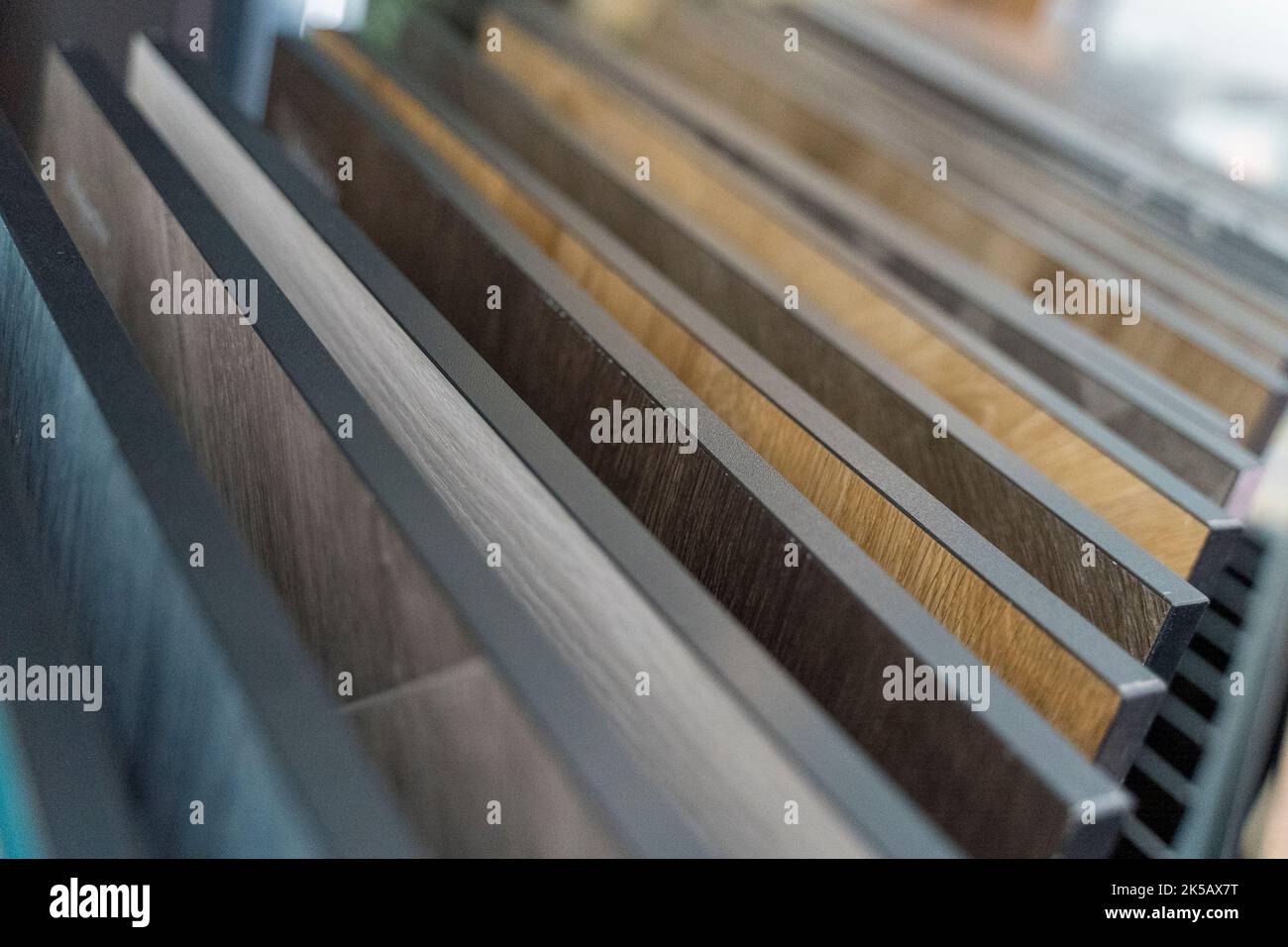 Luxury Vinyl Tile flooring samples at a high end flooring showroom ...