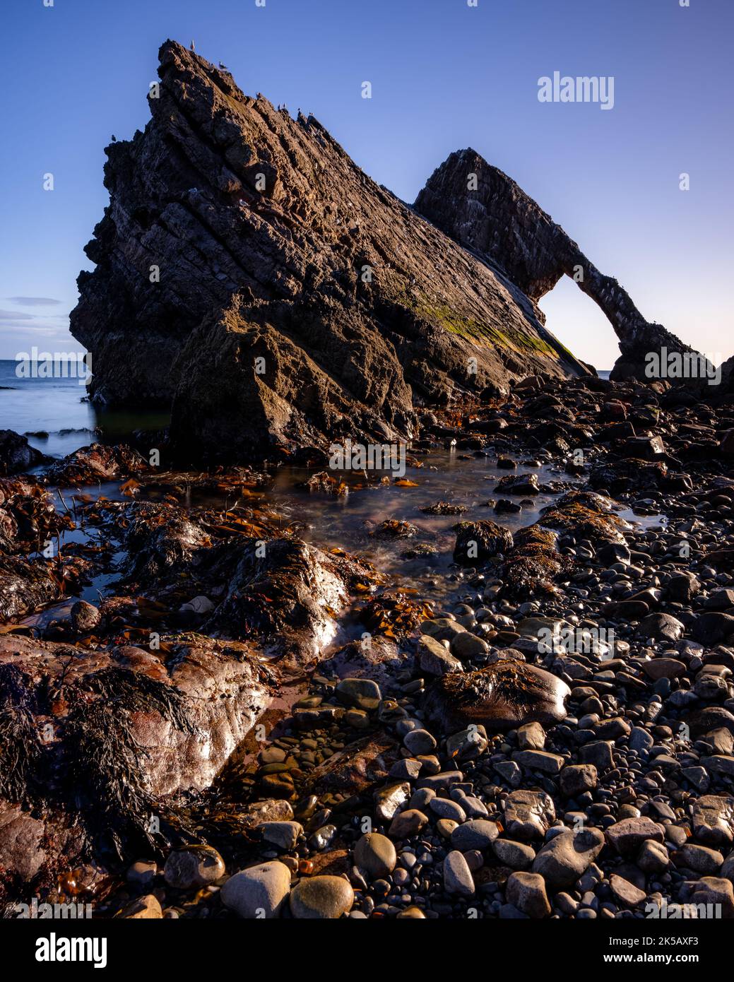 A beautiful view of the Bow Fiddle Rock on the northeast coast of ...