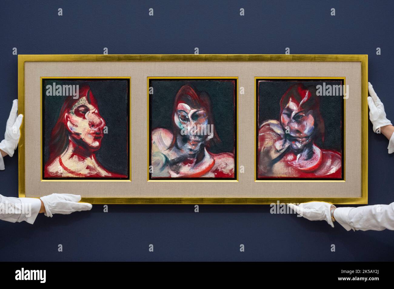 London, UK. 7 October 2022. Technicians present "Three Studies for ...