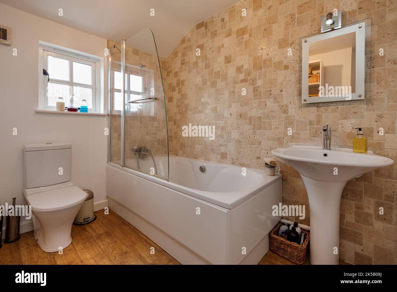Traditional partially tiled bathroom Stock Photo - Alamy